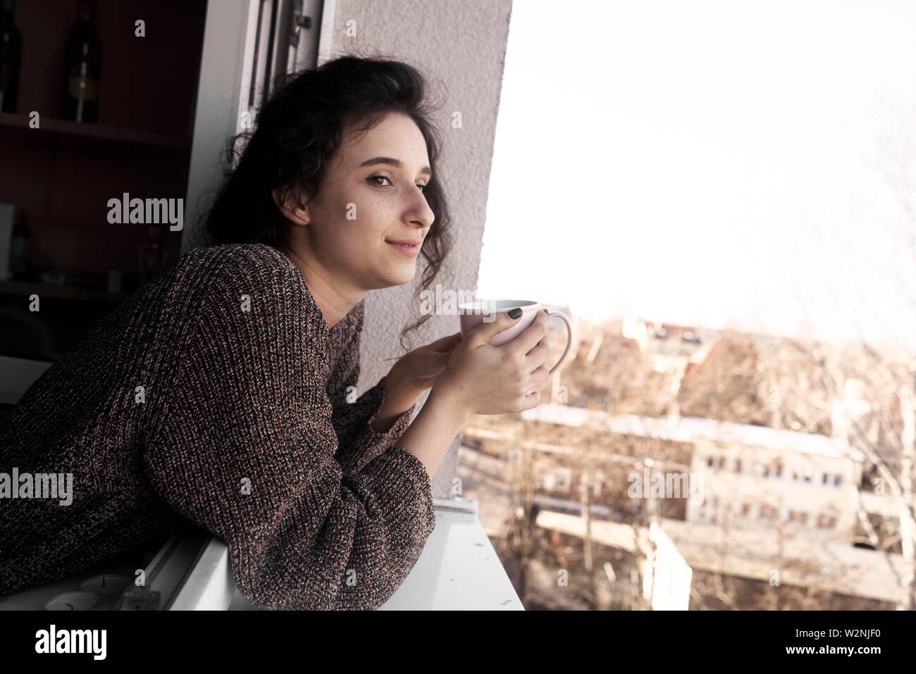 Leaning On Windowsill High Resolution Stock Photography and Images - Alamy
