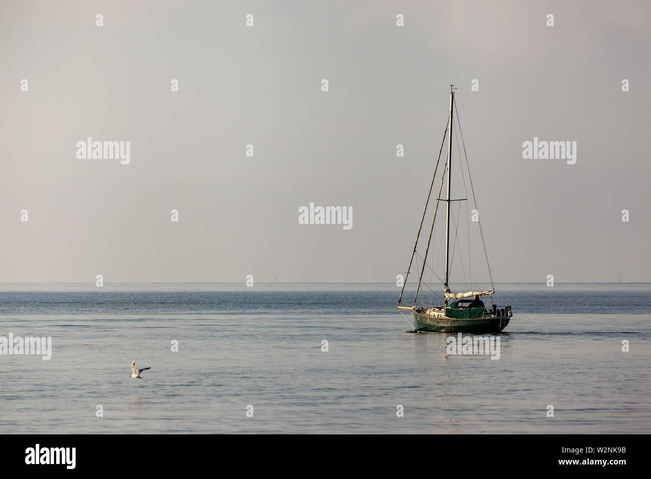 Old sailing boat setting off for sea Stock Photo - Alamy