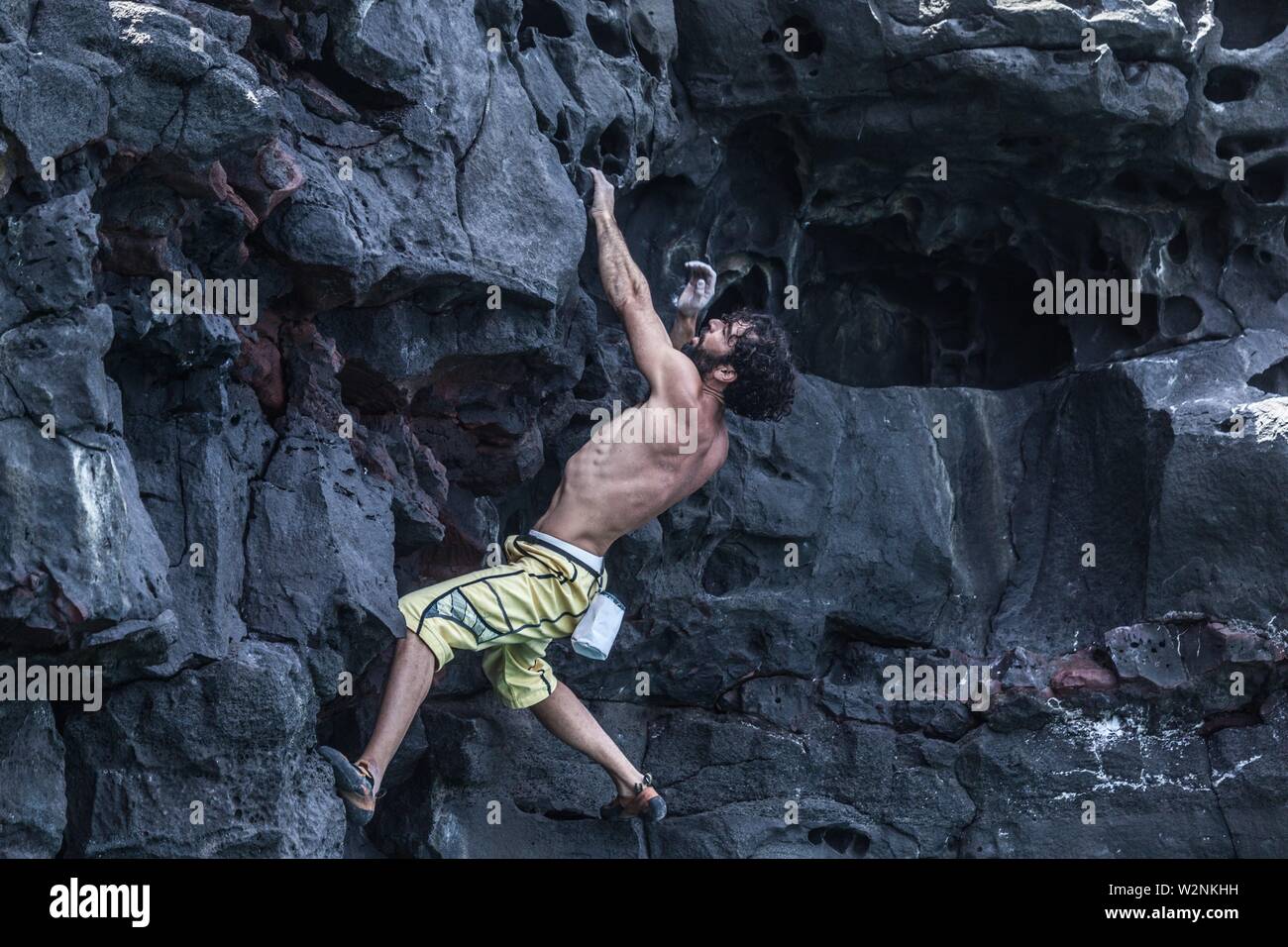 Deep-water soloing in Tenerife island Stock Photo - Alamy