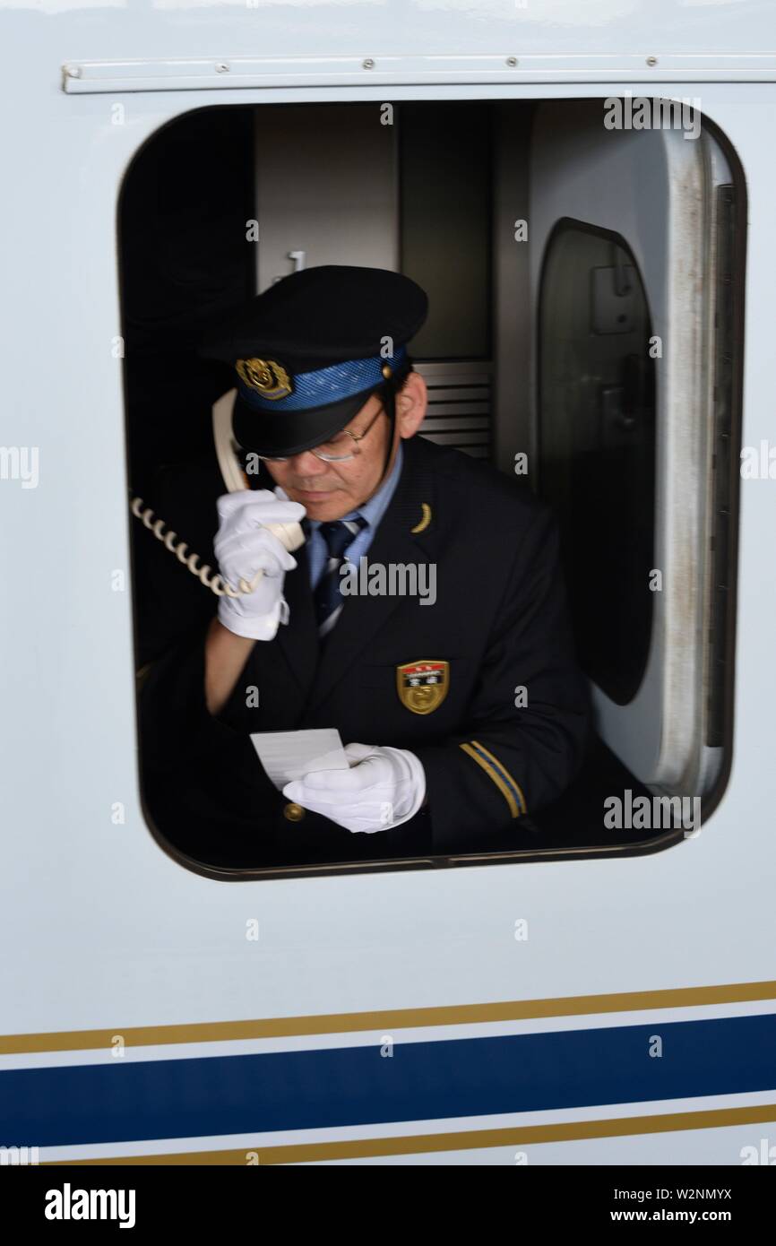 Shinkansen conductor hi-res stock photography and images - Alamy