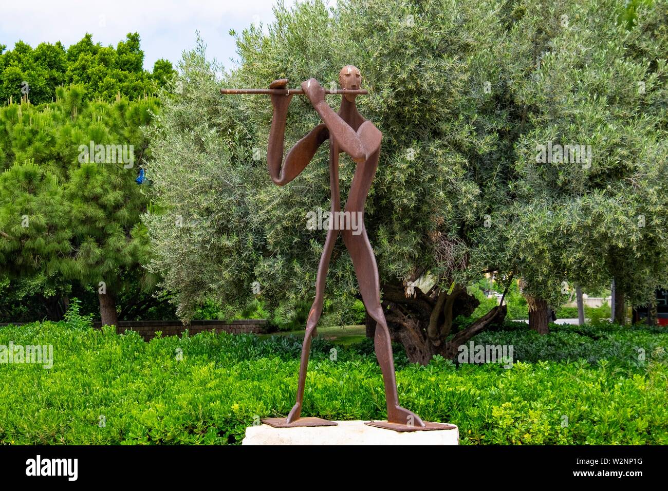 Statue flute player hi-res stock photography and images - Alamy
