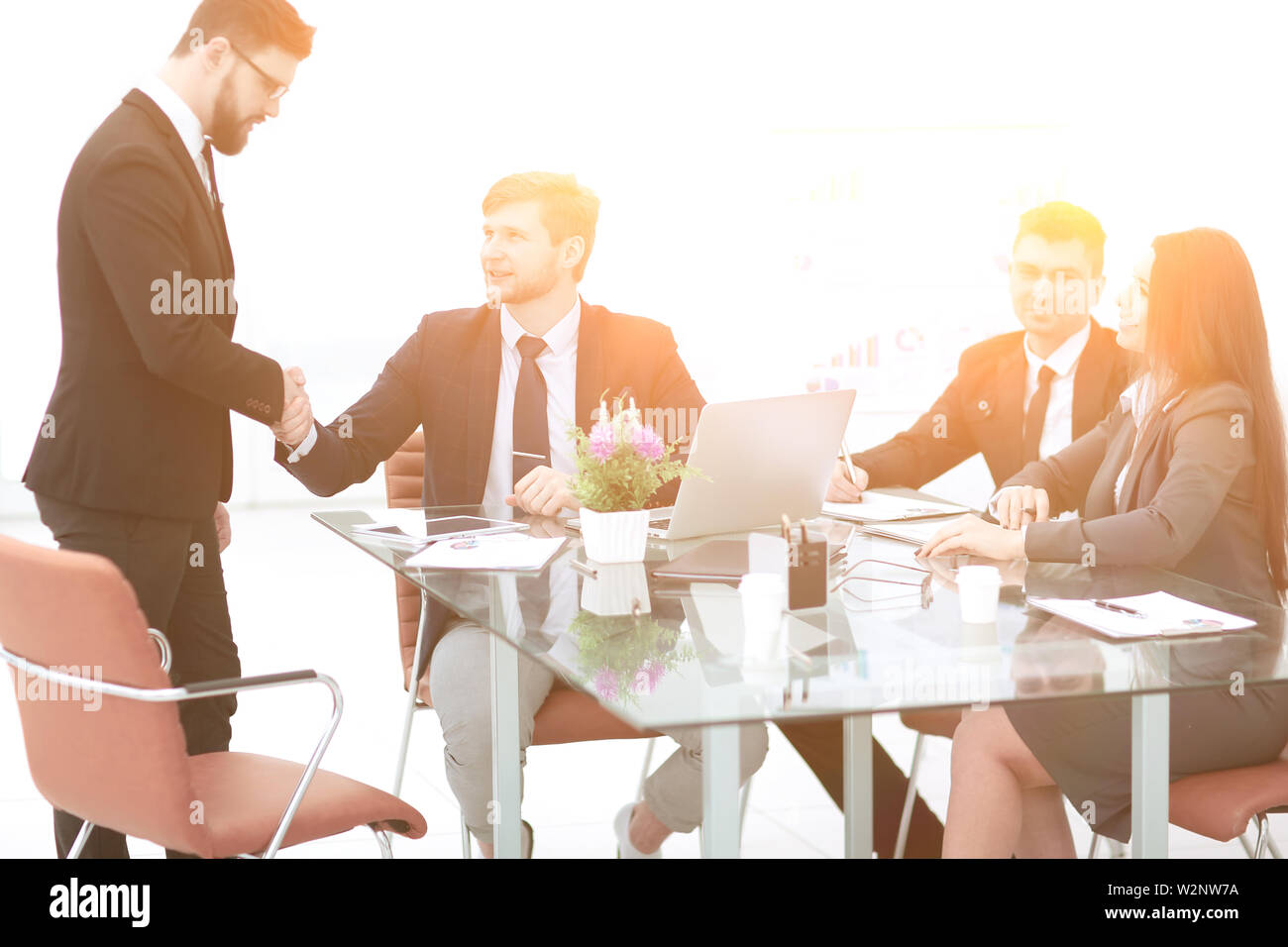 handshake Manager and employee in the workplace.photo with copy space ...