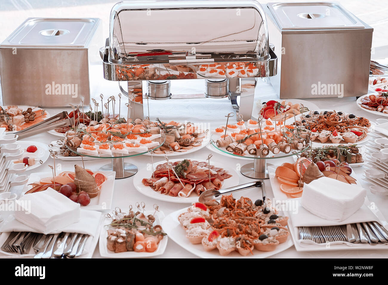 variety of snacks and dishes on the table in the modern restaurant ...
