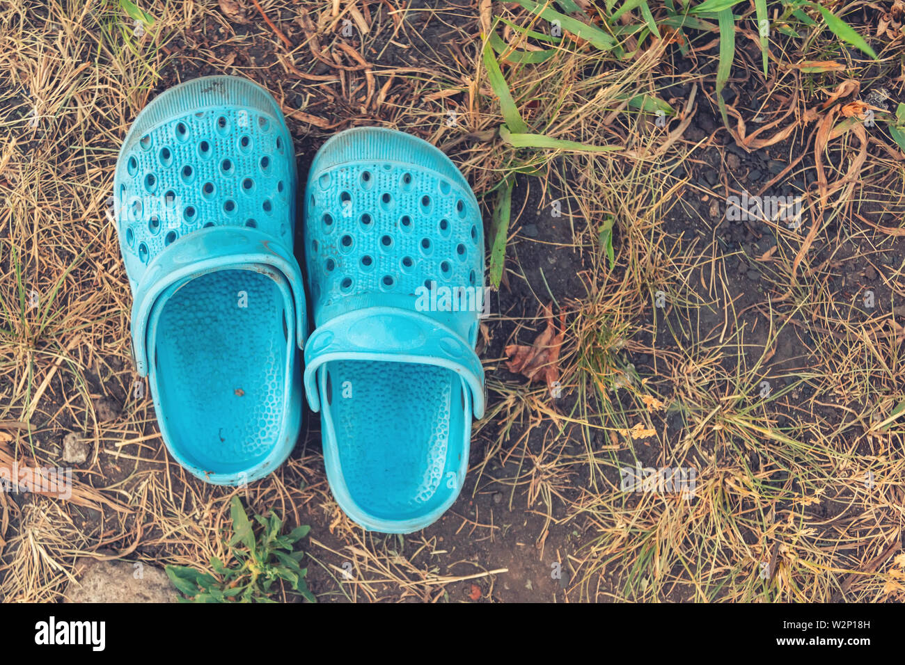 street slippers stand on the grass, stand on the ground for walking ...