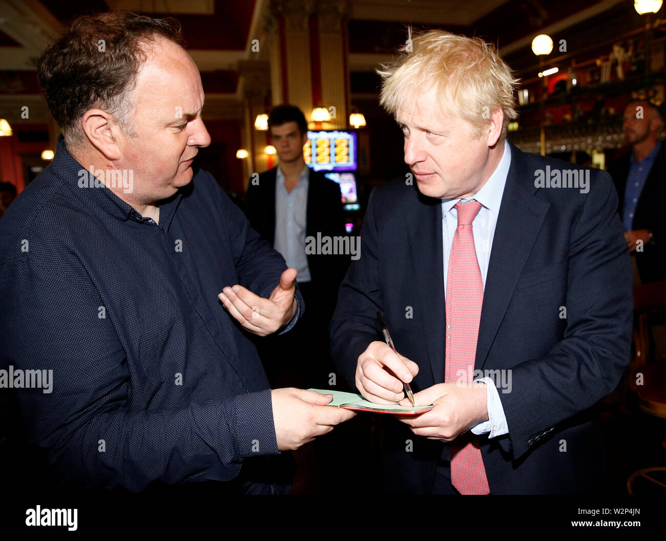 Conservative Party leadership candidate Boris Johnson sings an ...