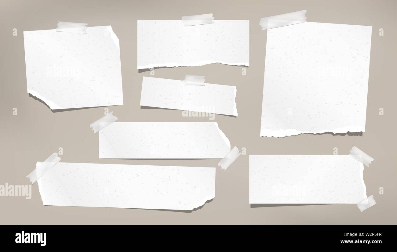 White grainy ripped, torn note, notebook paper strips, stuck with ...