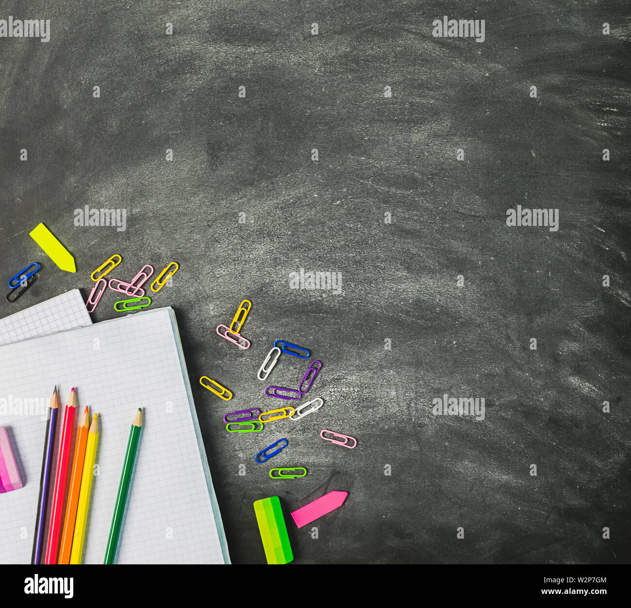Educational supplies notebooks pens pencils against the background of a ...