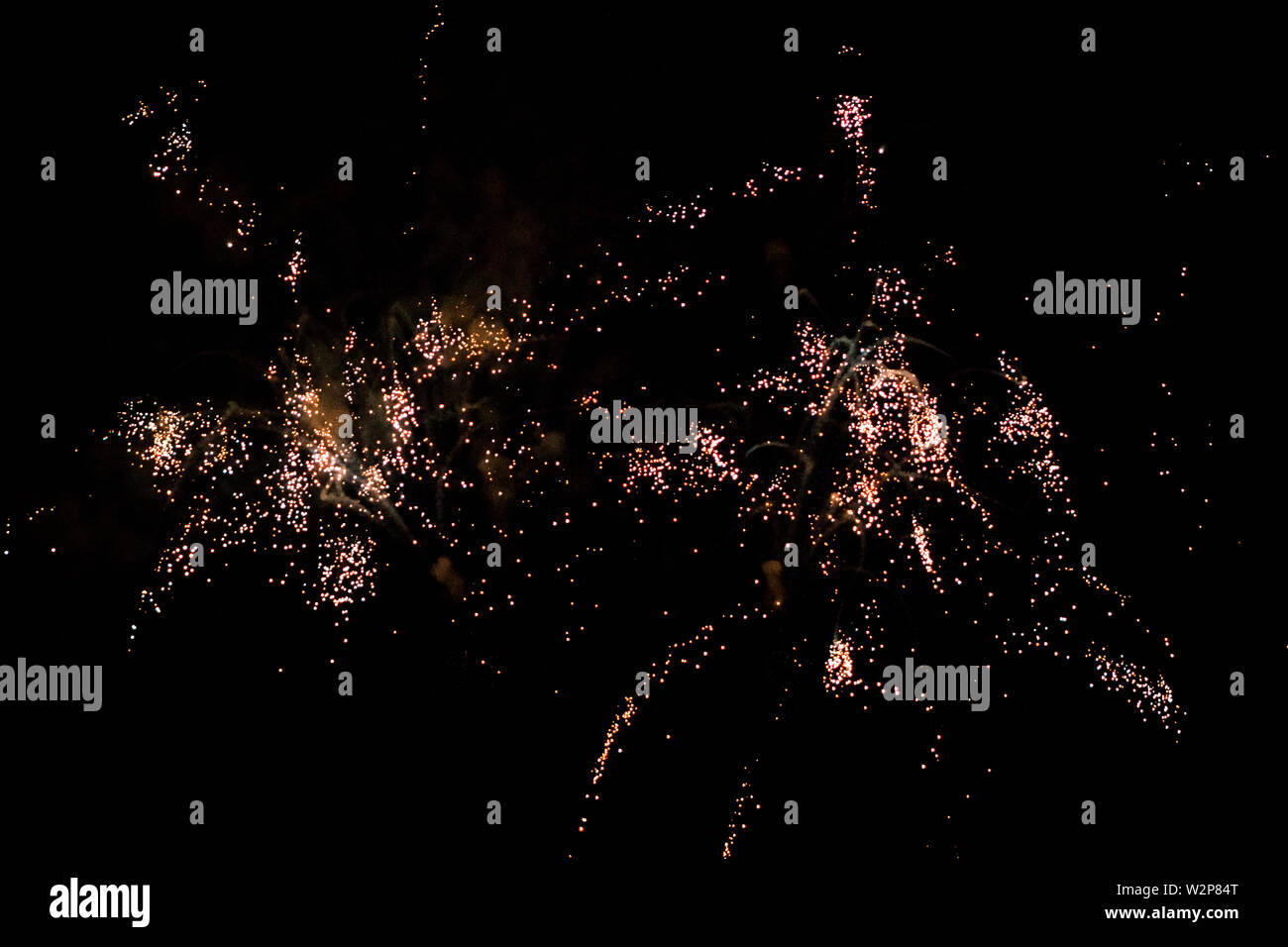 Crackling fireworks exploding during a display Stock Photo - Alamy