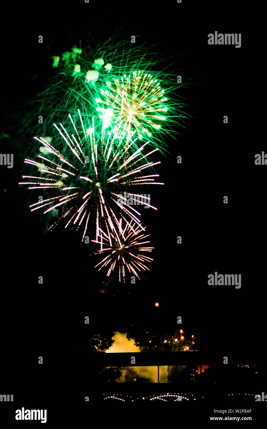 Fireworks being launched from the Gillette Bridge above the Grand River ...