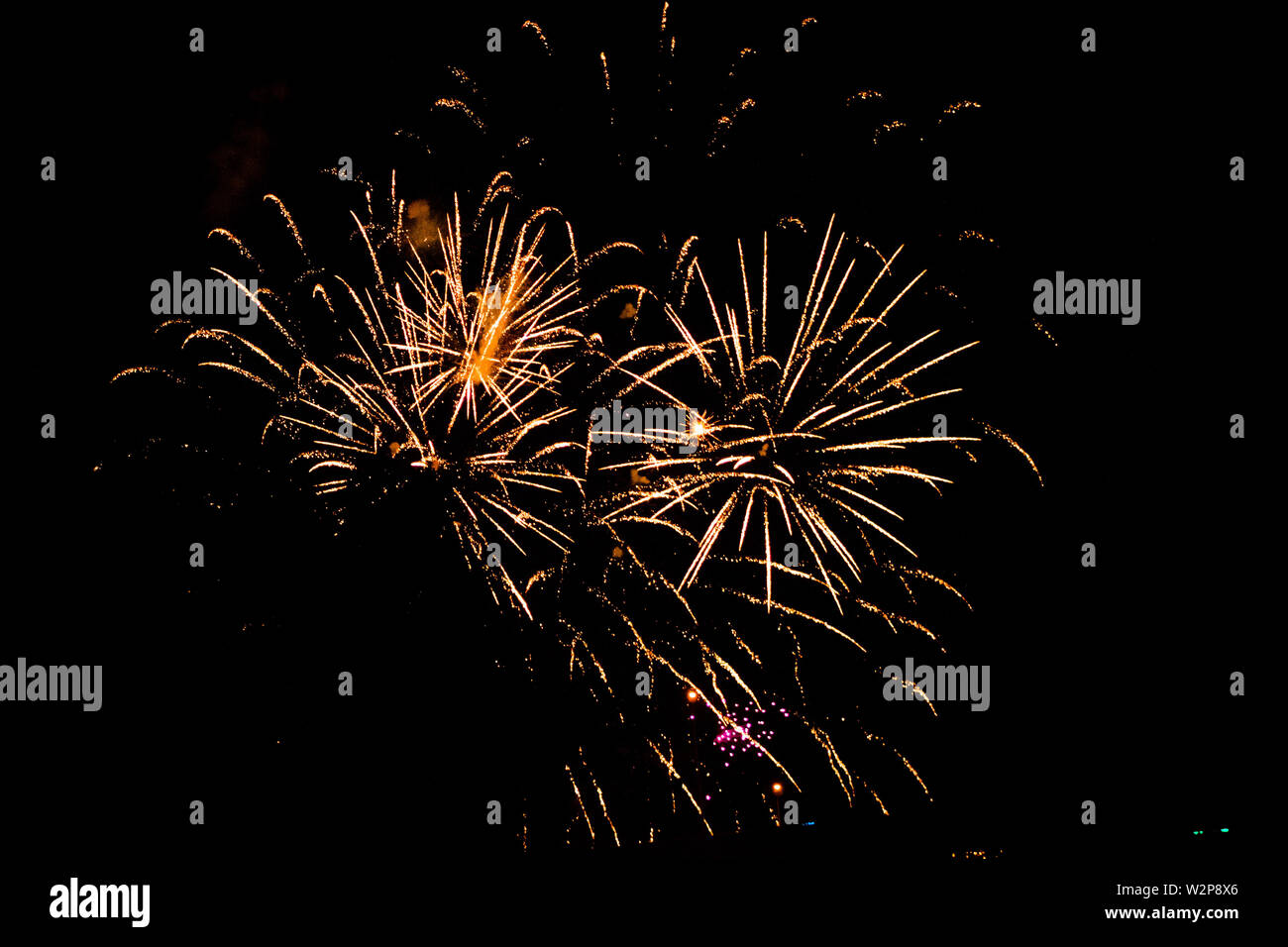 Two fireworks on display during an event Stock Photo - Alamy