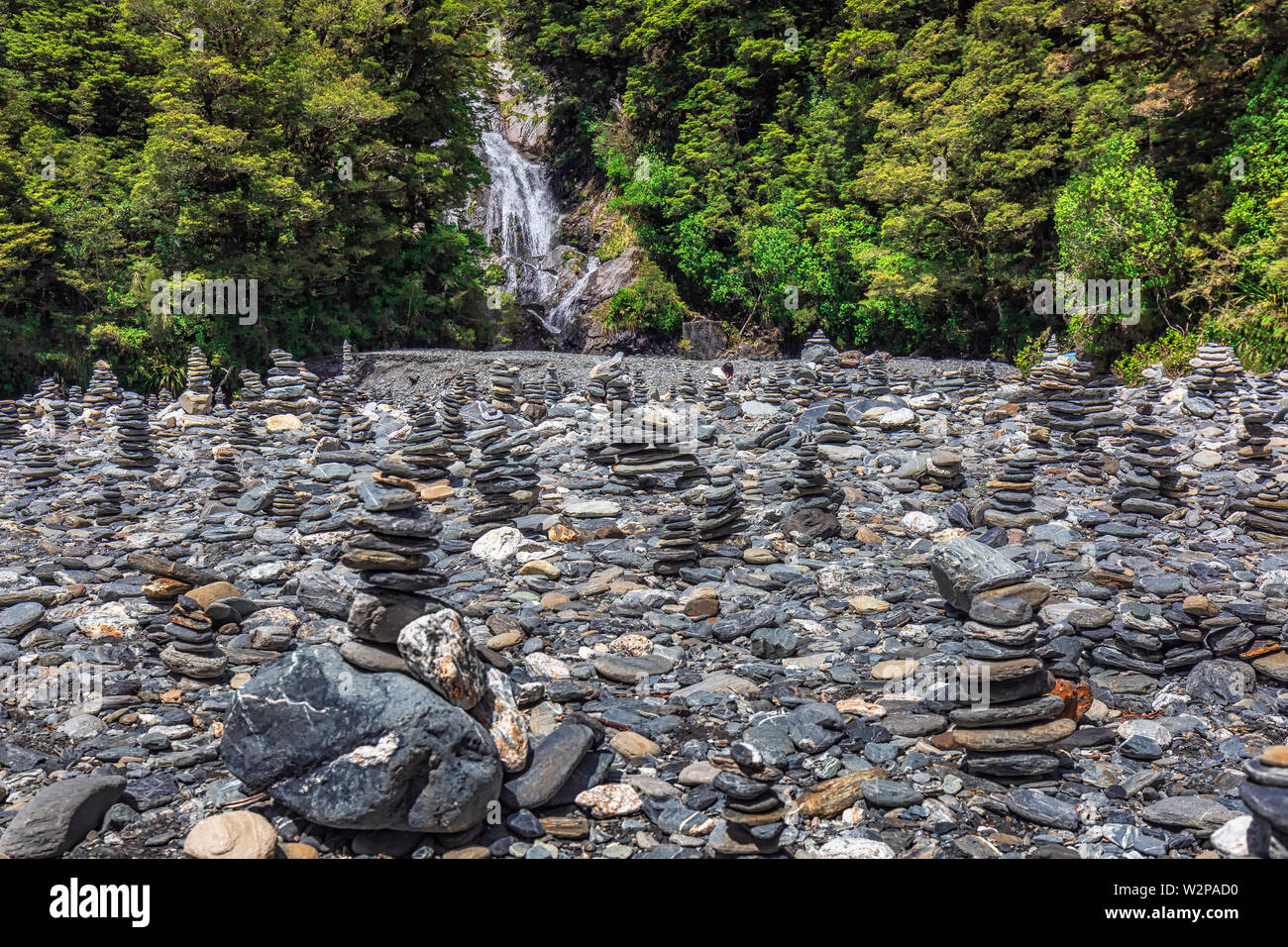 Stacks of rocks at Fantail Falls at the trailhead for Mt. Brewster at ...
