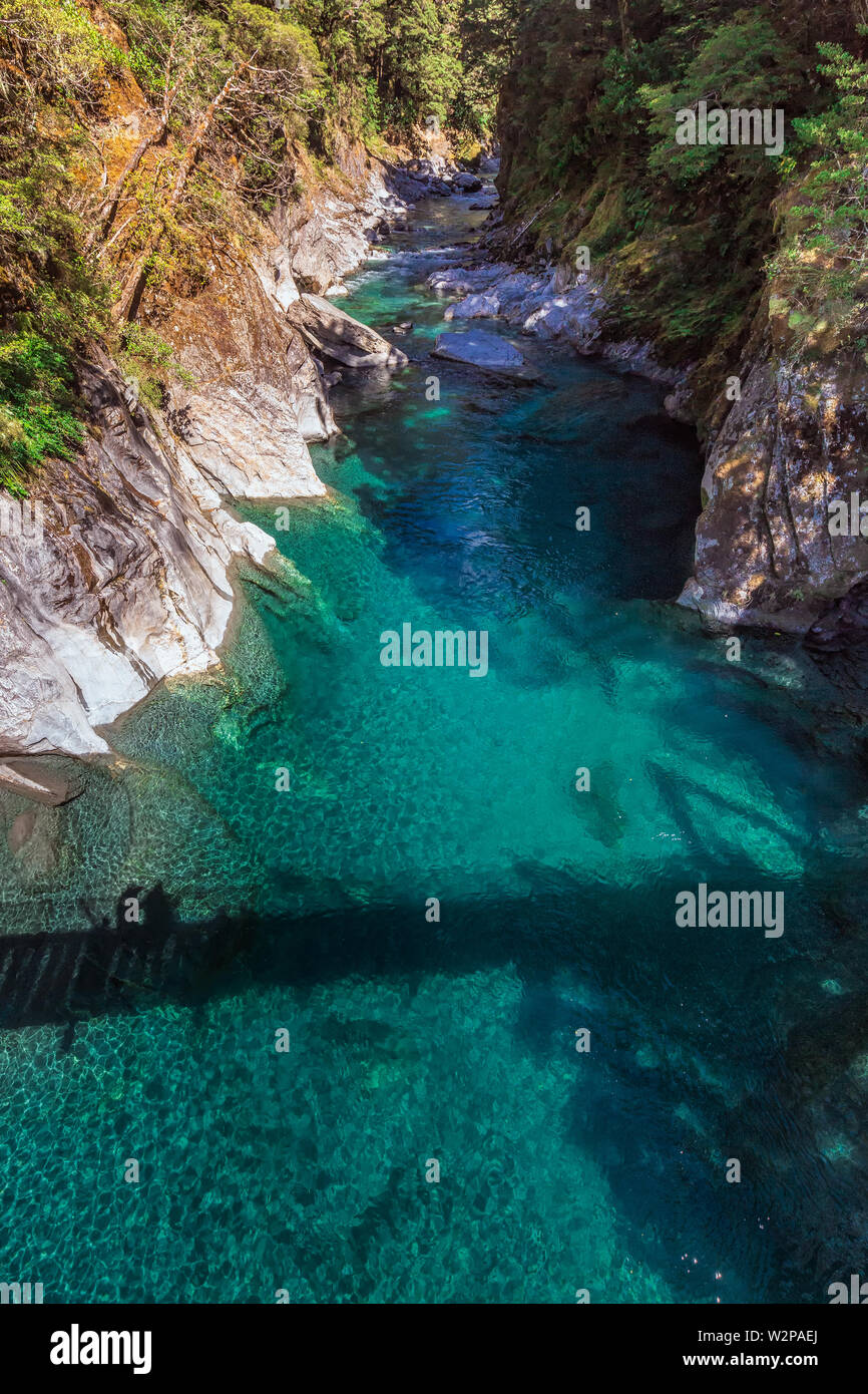 The swing bridge on Blue Pool in Wanaka, New Zealand Stock Photo - Alamy