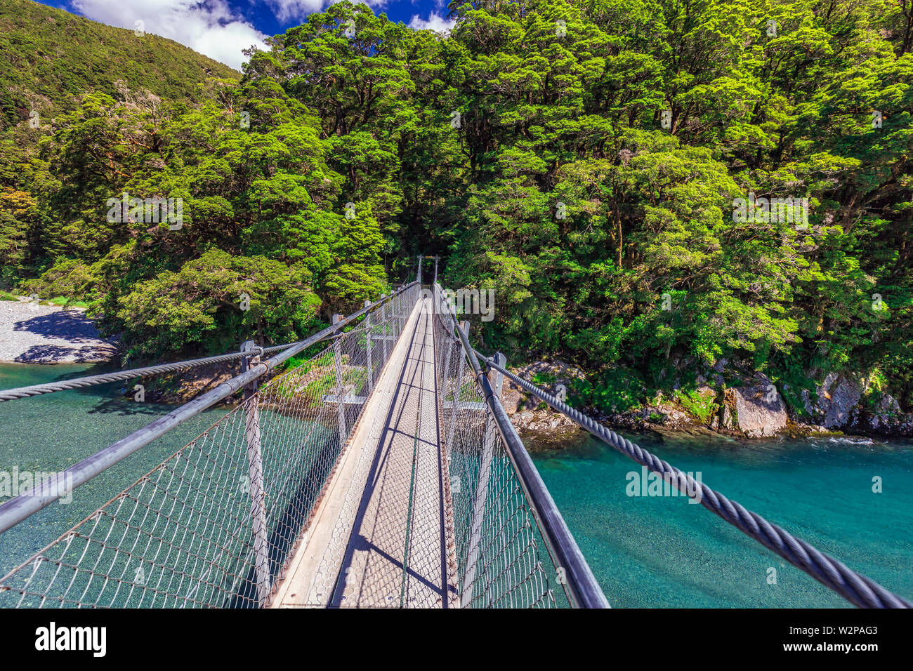 The swing bridge on Blue Pool in Wanaka, New Zealand Stock Photo - Alamy