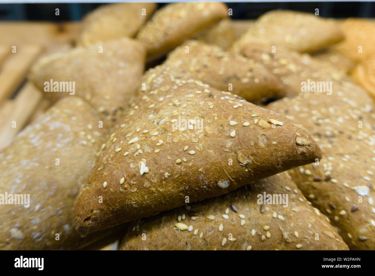 triangle bread with sunflowers seeds and broken flax seeds sold at the ...