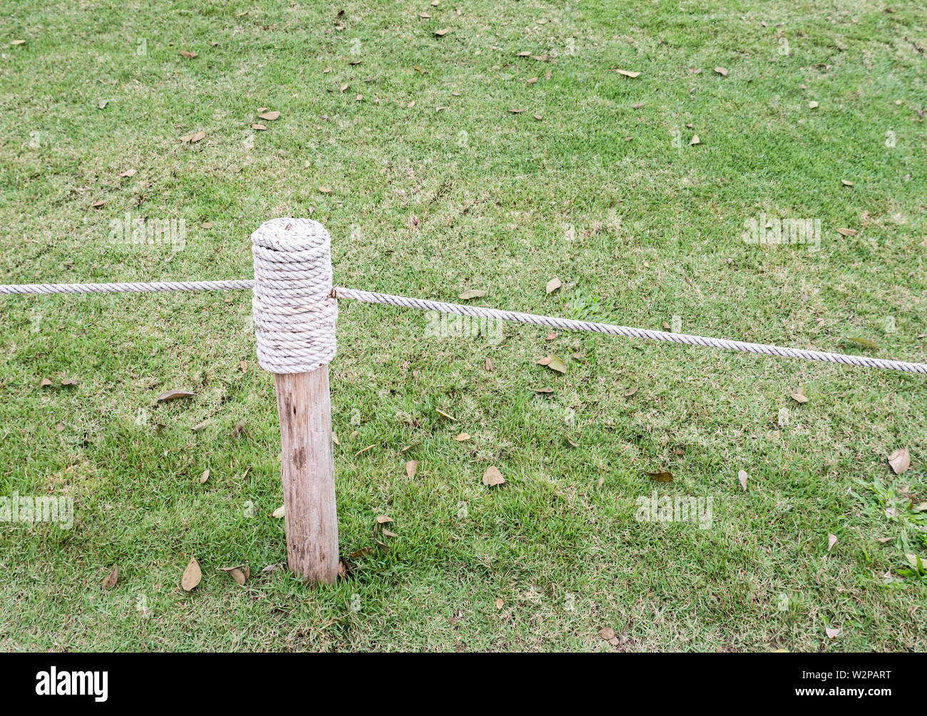 Rope fence for preventing entry into the lawn in the public park Stock ...