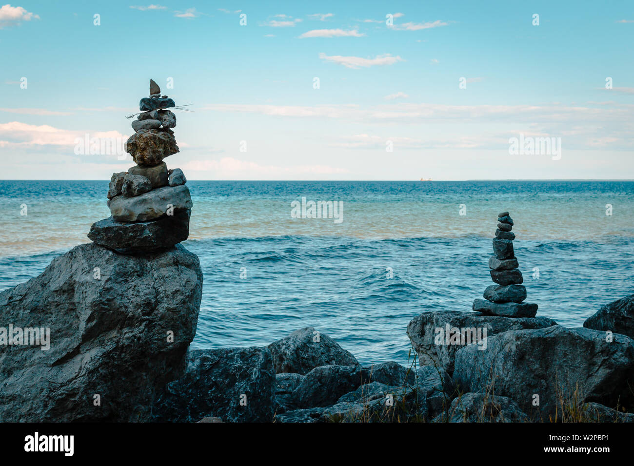 Stacked stones looking over Lake Huron Michigan Stock Photo - Alamy