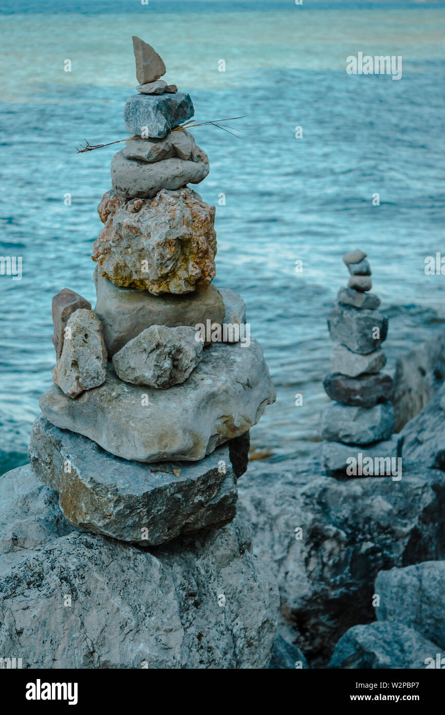 Stacked stones on the coast of Mackinac Island Stock Photo - Alamy