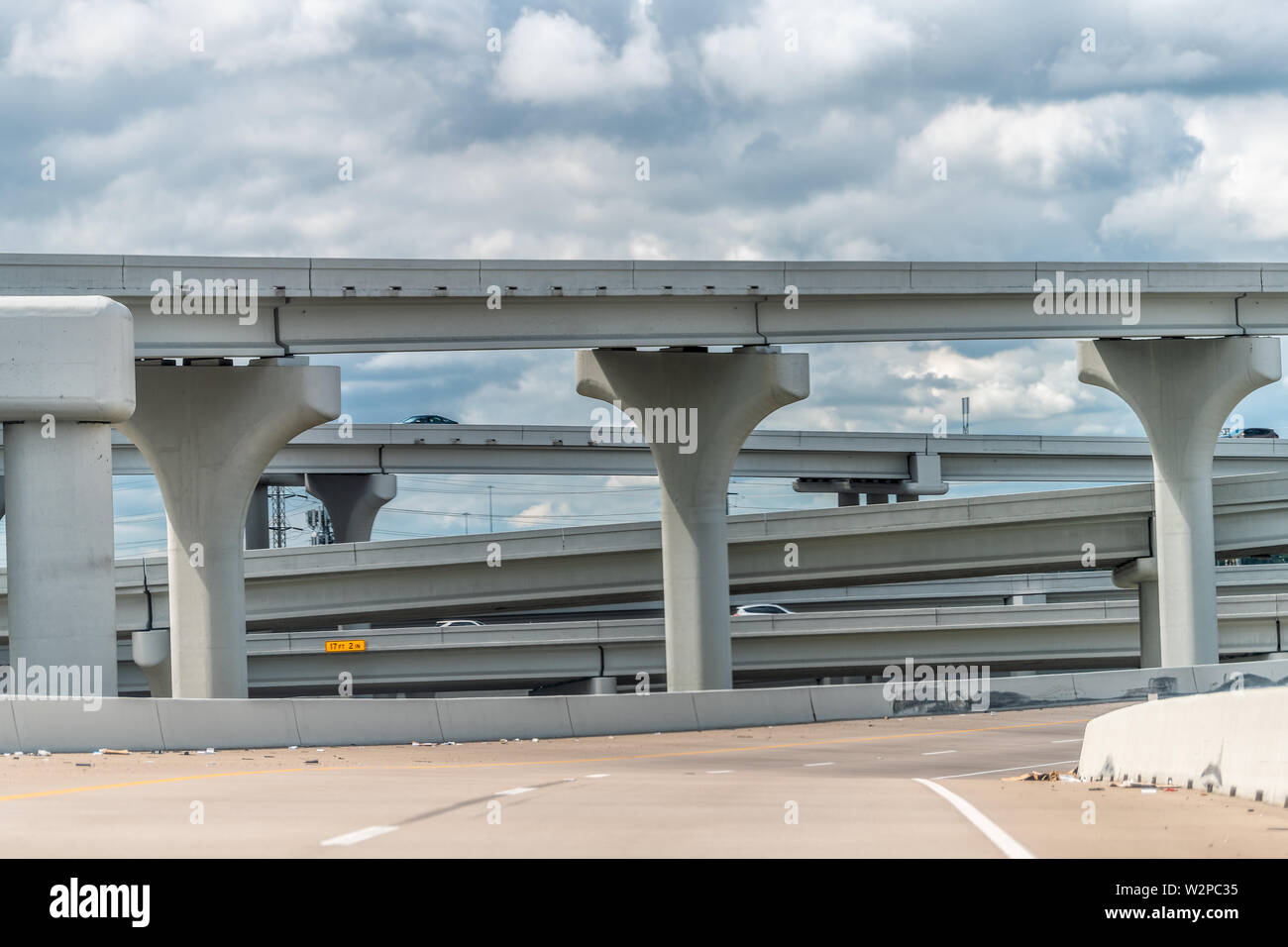 Dallas, Texas downtown elevated highway in city in summer with trash on ...