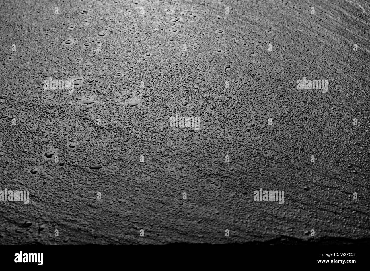 Wet slate stone dark background top view Stock Photo - Alamy