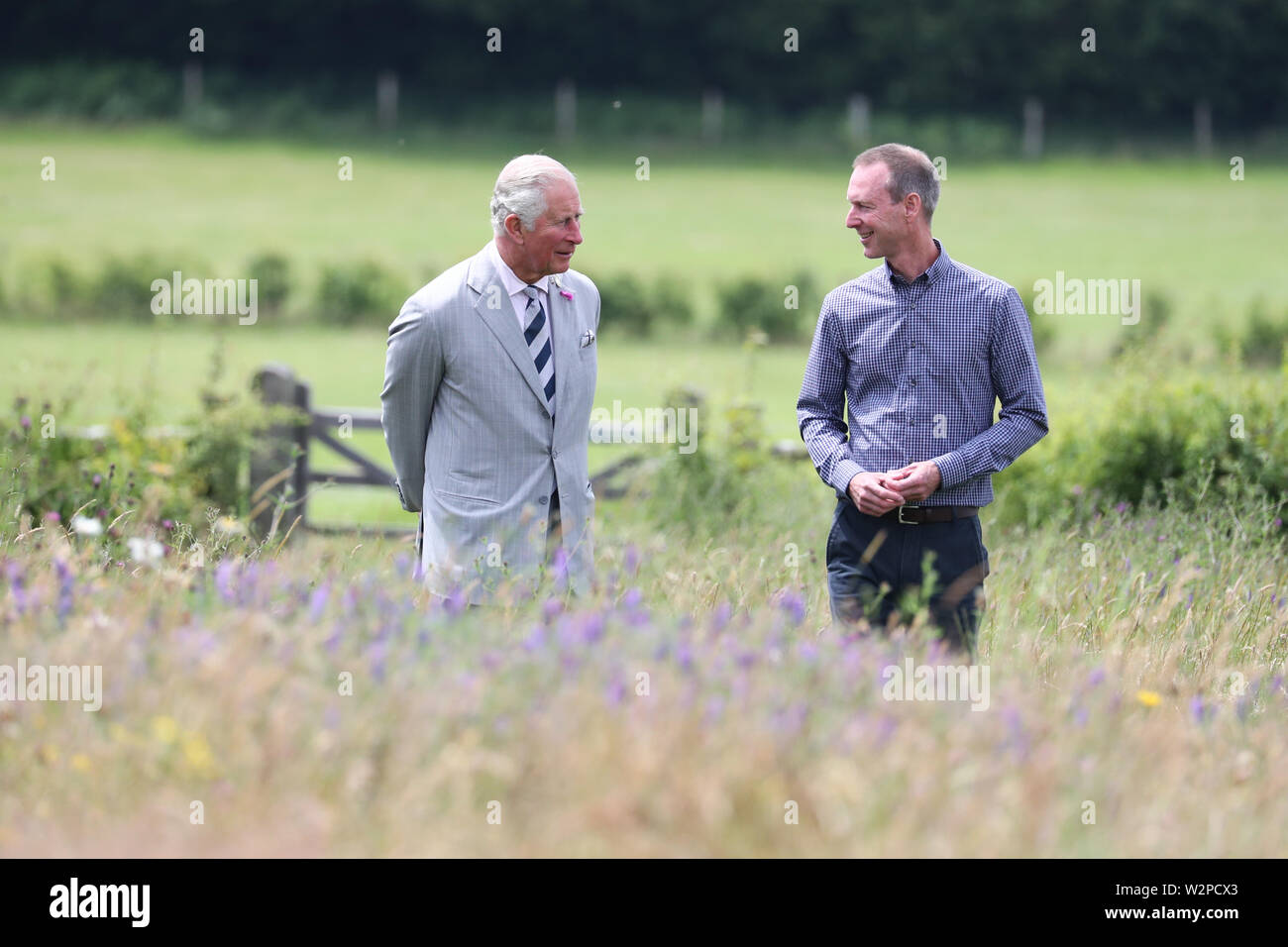 The Prince of Wales (left) speaks with Iain Parkinson in the Coronation ...