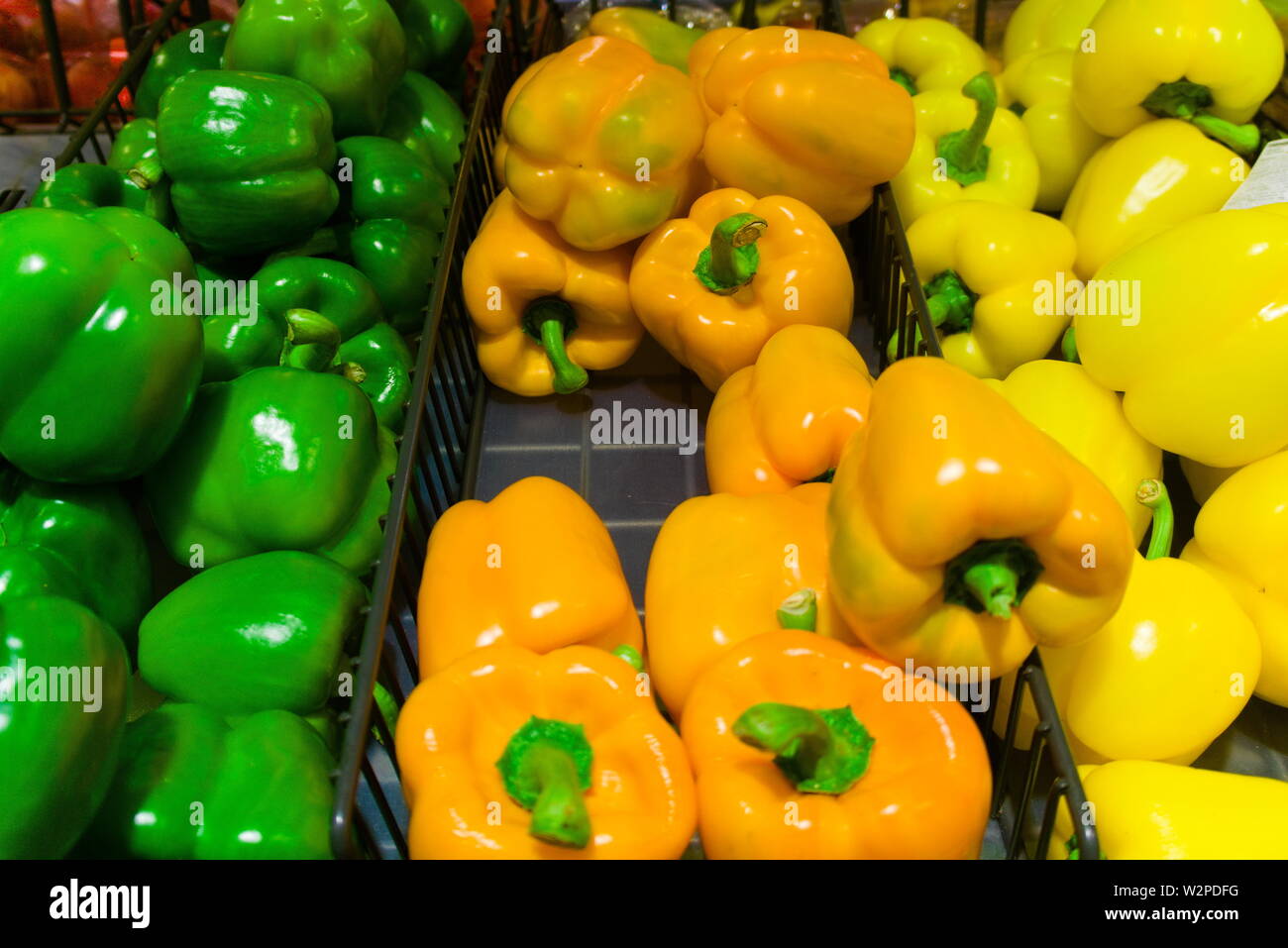 collection of colorful bell pepper in the store Stock Photo - Alamy