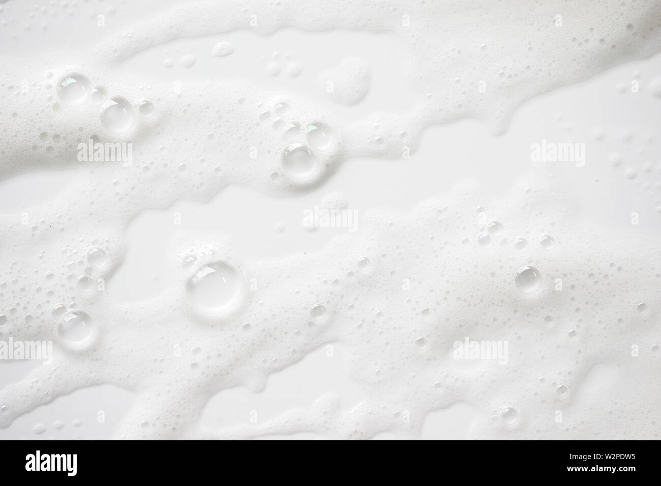 Abstract background white soapy foam texture. Shampoo foam with bubbles ...