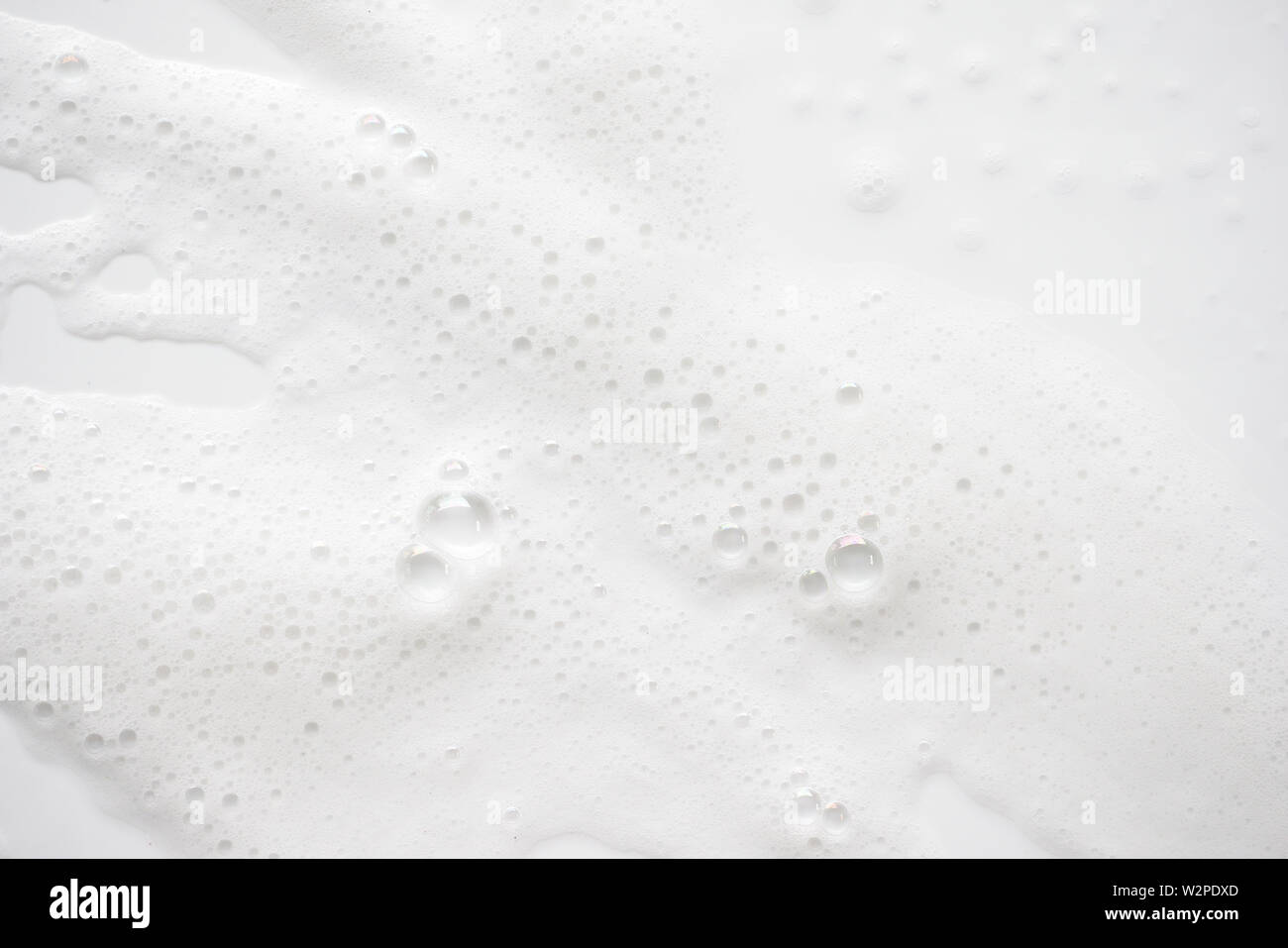 Abstract background white soapy foam texture. Shampoo foam with bubbles ...