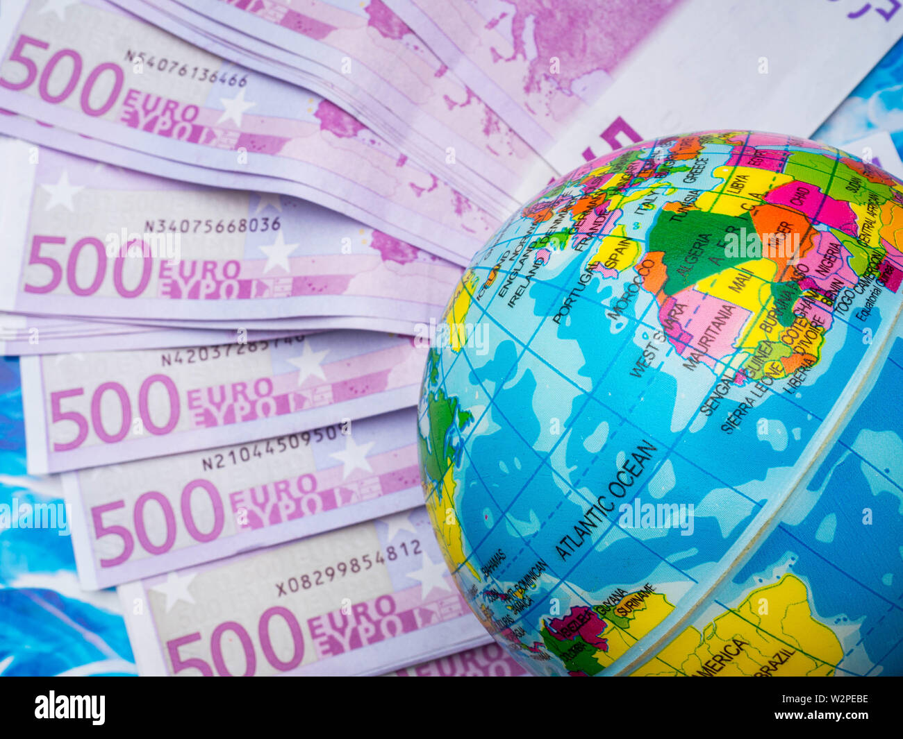 Globe, map of Europe, Eu banknotes in denominations of 500 euros ...