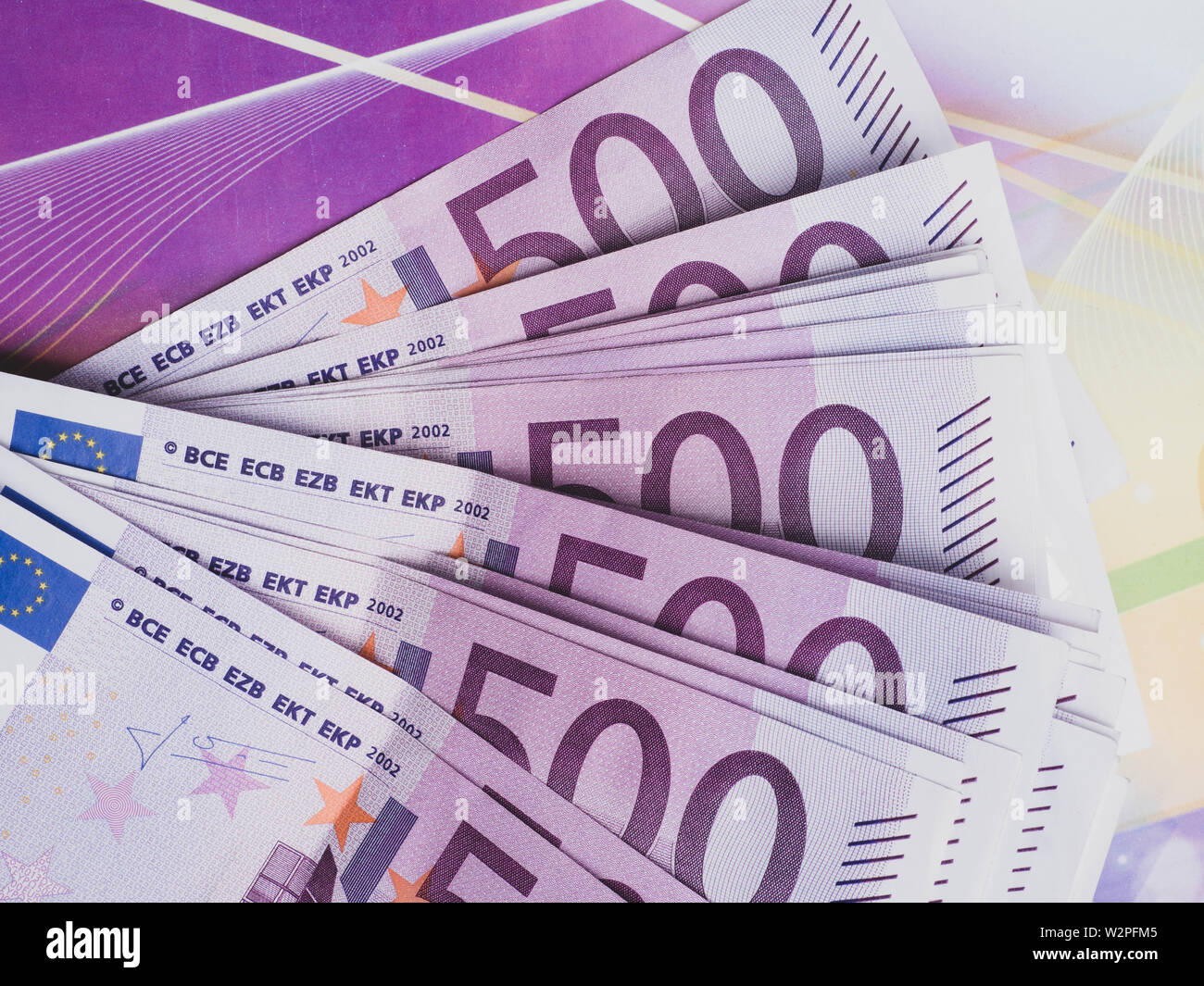 Europian currency euros banknotes on color background Stock Photo - Alamy