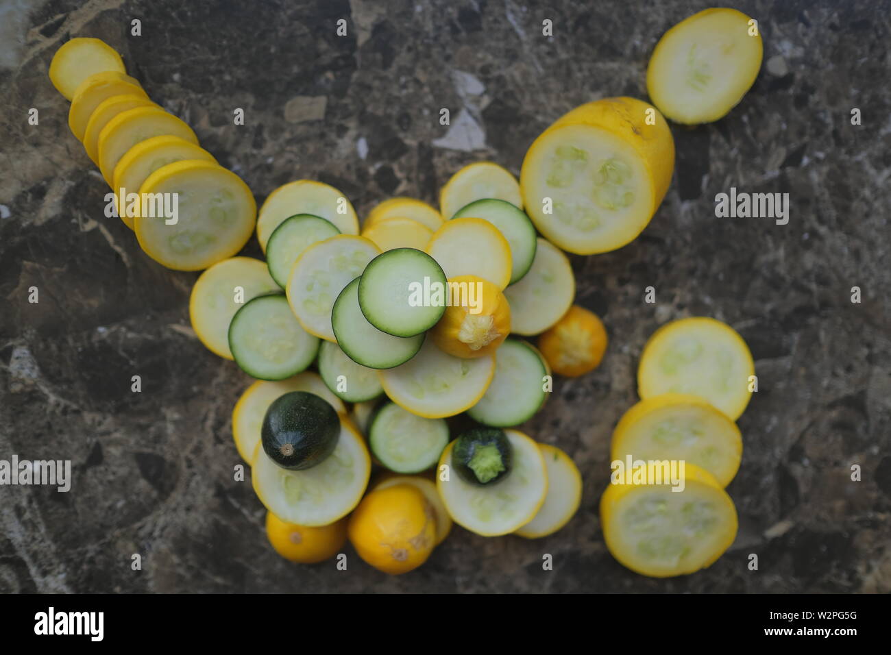 Yellow zucchini cut into circles Stock Photo - Alamy