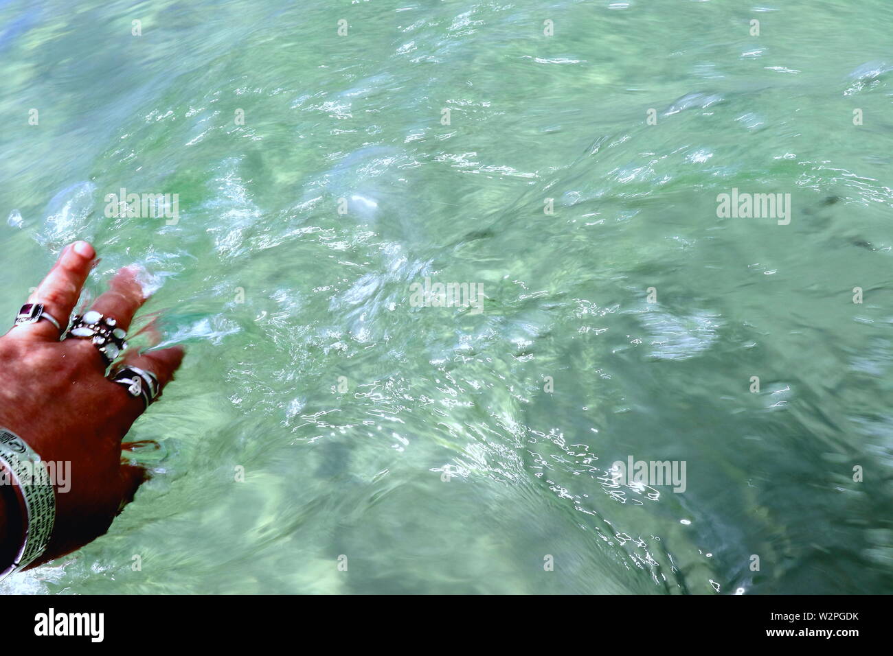 Female hand reaching water hi-res stock photography and images - Alamy