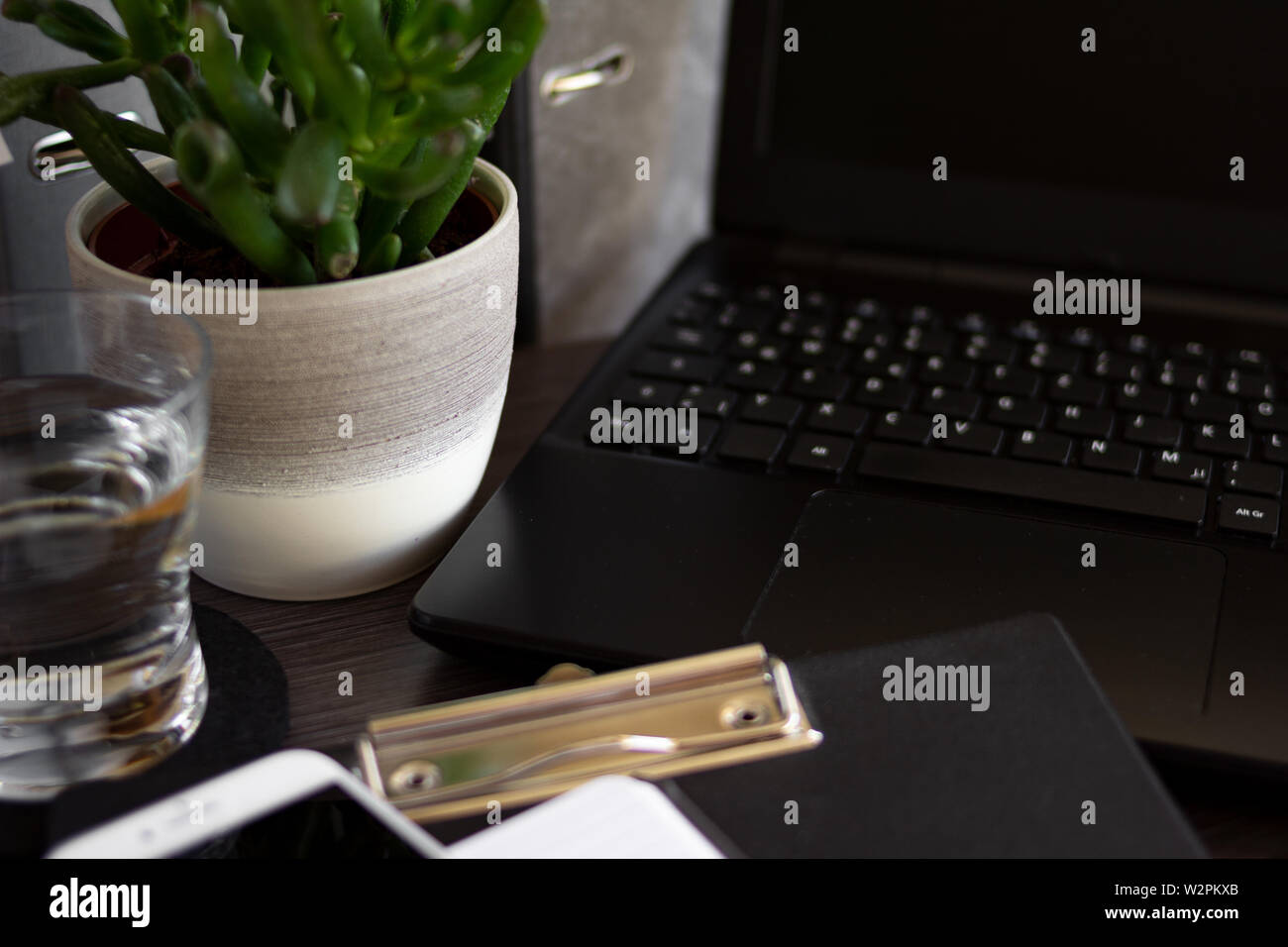 Innovative Office desk with smart phone, Laptop and a Notebook. Concept ...