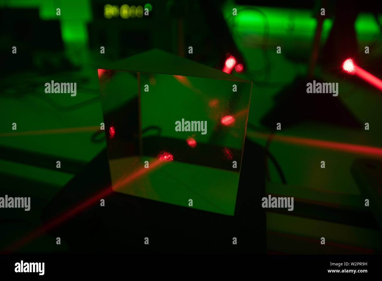 Experiment with a red laser in a physics lab Stock Photo - Alamy