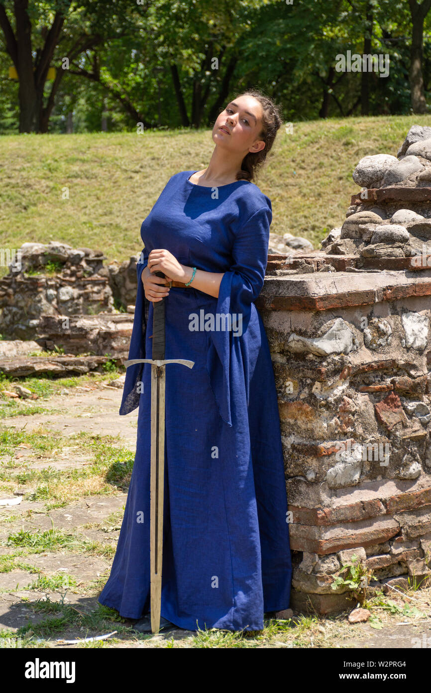 Nis, Serbia - June 15. 2019 Portrait of a medieval lady in a blue dress ...