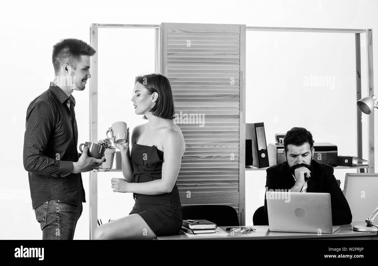 Lets break. Two coworkers having tea break. Young managers talking ...