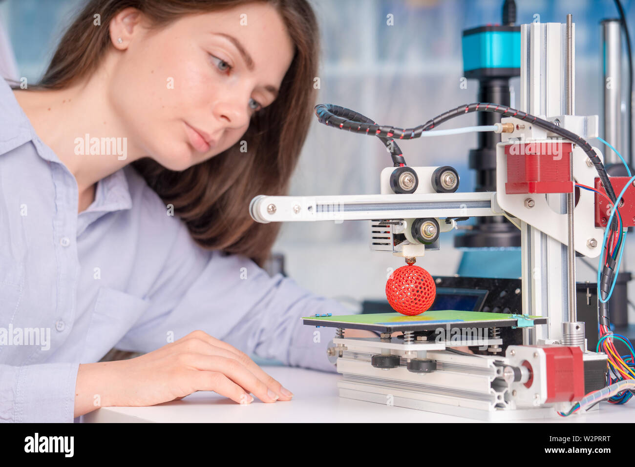 A student girl print prototype on 3D printer Stock Photo - Alamy