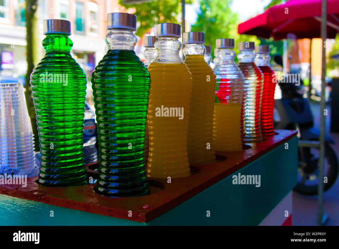 colorful syrups drinks sold on the street fair Stock Photo - Alamy