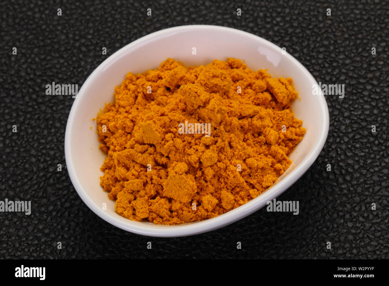 Aroma turmeric powder in the bowl Stock Photo - Alamy