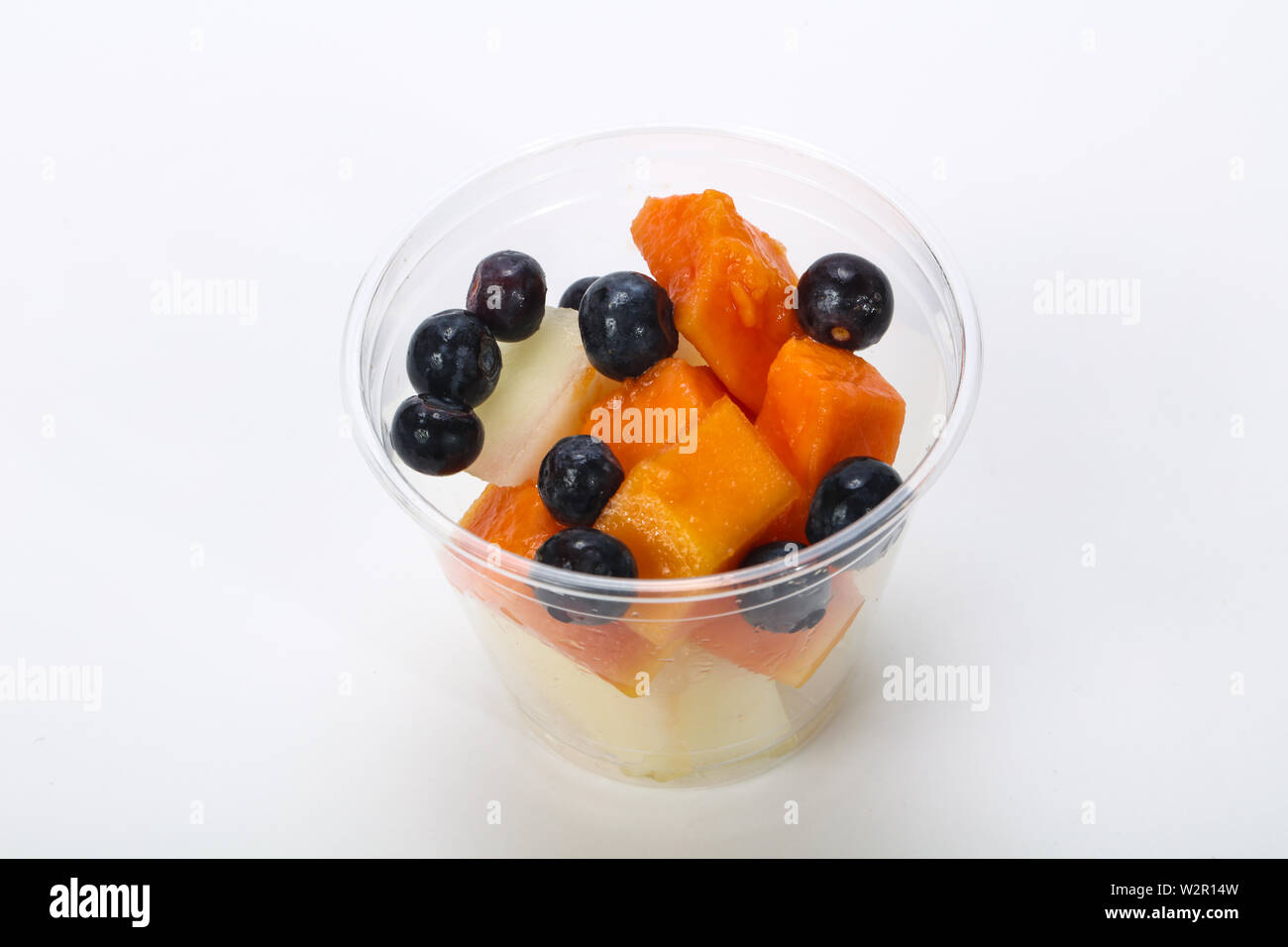 Sliced tropical fruit mix snack in the box Stock Photo - Alamy