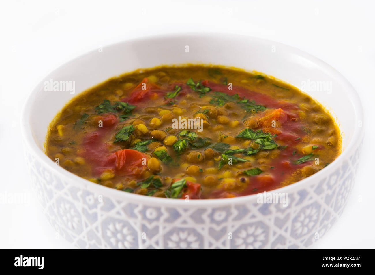 Indian lentil soup dal (dhal) in a bowl isolated on white background ...