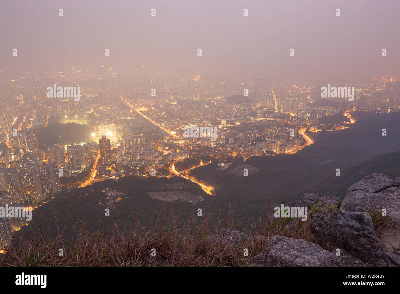 Hong kong tall buildings in haze Stock Photo - Alamy