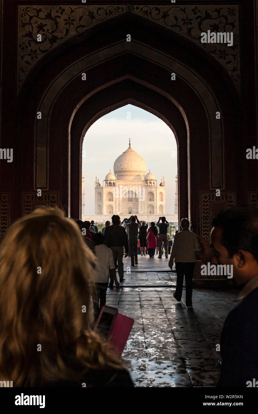 Looking through the main entrance gate at The Taj Mahal in Agra, India ...