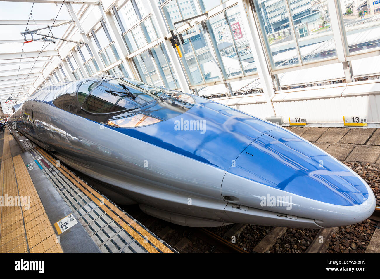 Blue Shinkansen Bullet Train at the platform of Tokyo Station, Japan ...