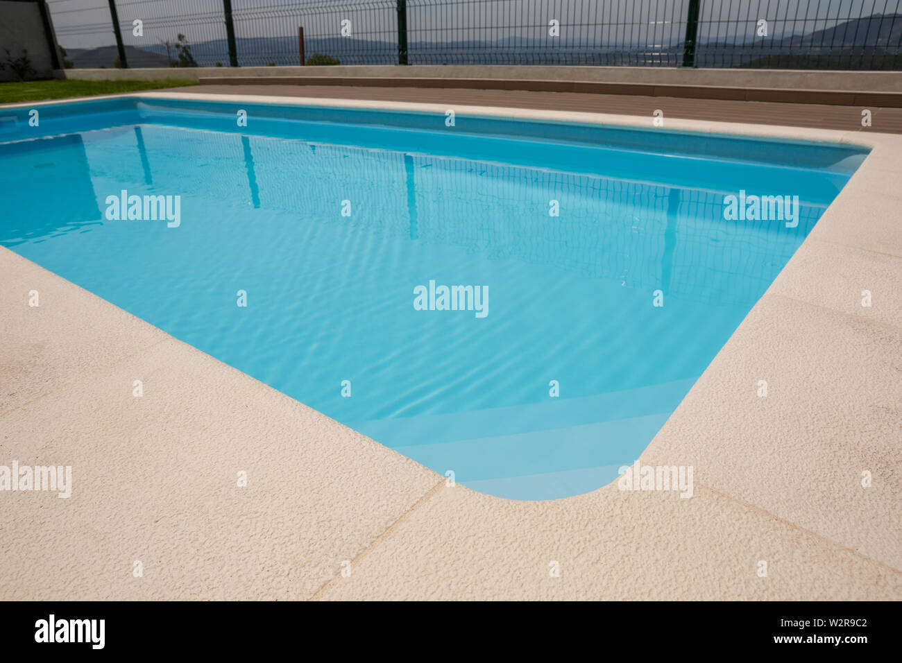 swimming pool with blue water Stock Photo - Alamy