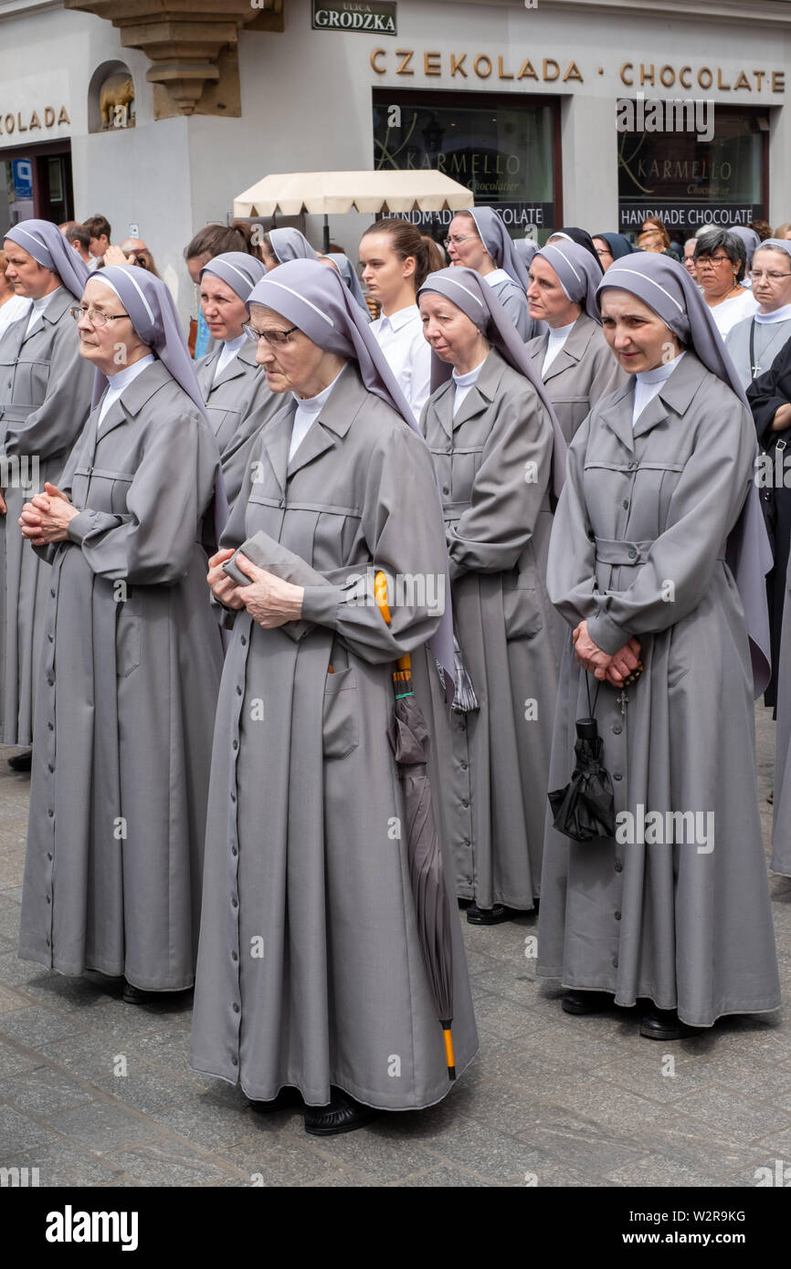 Nuns taking part in a procession for the Feast of Corpus Christi, in ...