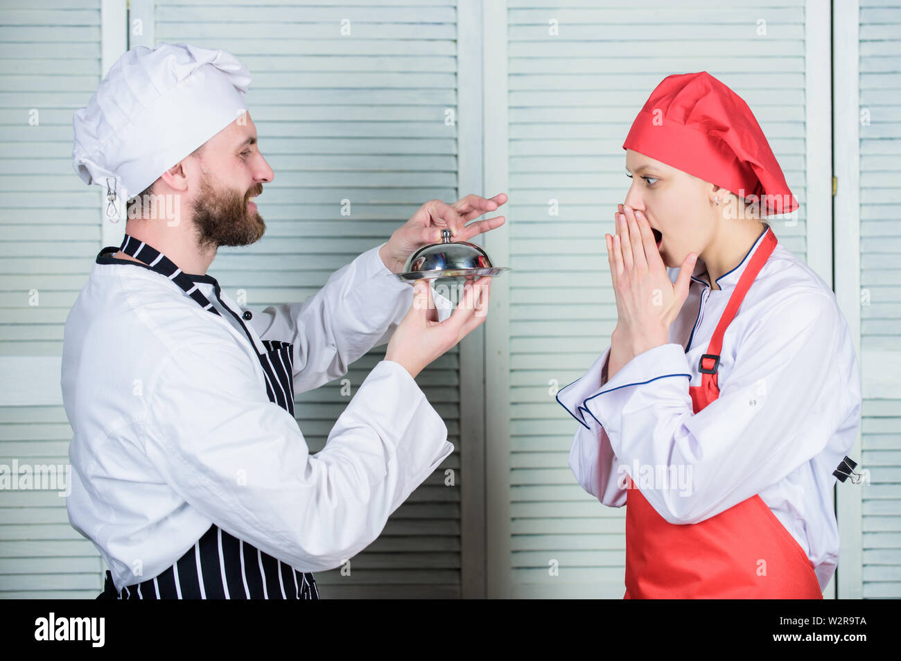 Happy moments together. man and woman chef in restaurant. couple in ...