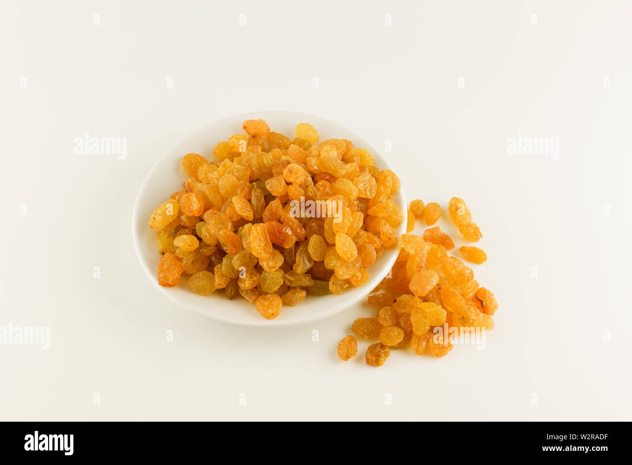 Fresh picked raisins isolated on white background and ready to eat ...