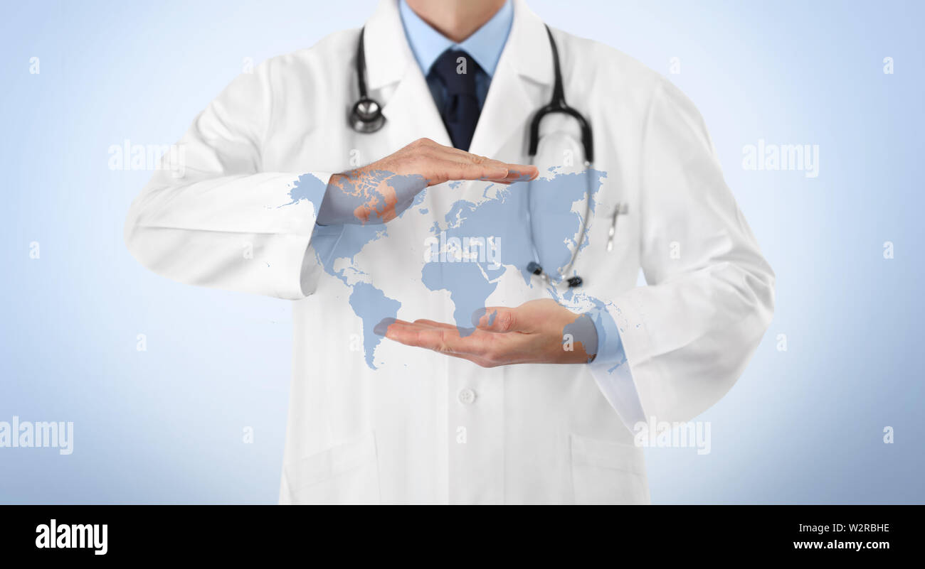 international medical coverage insurance concept, hands doctor covering ...