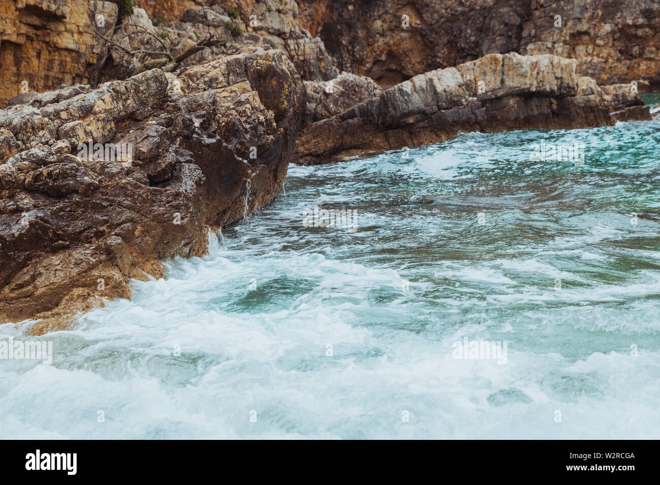 view of rocky sea beach in storm weather. copy space. background Stock ...