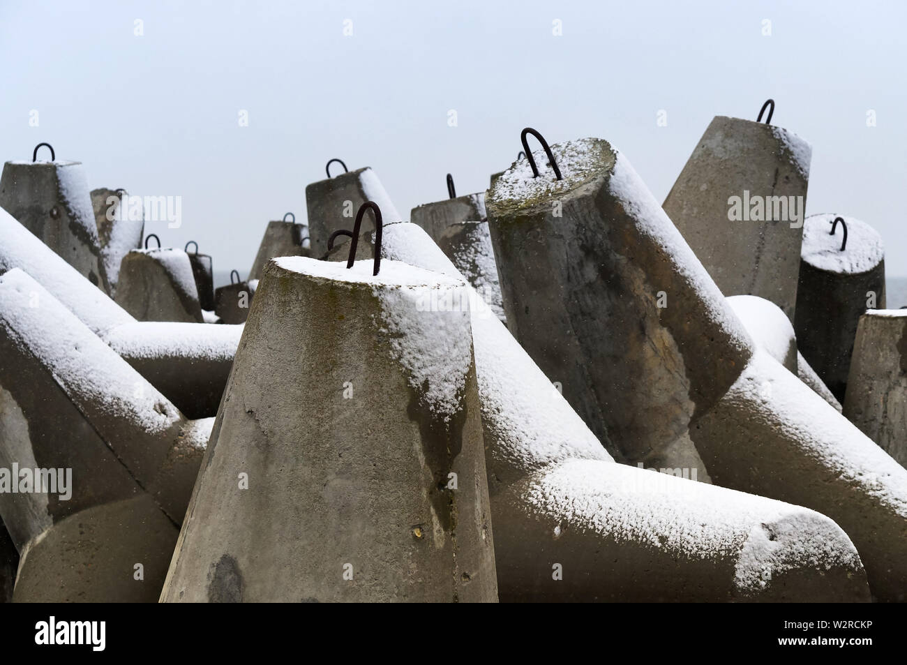 concrete breakwaters in snow, coastal fortifications in winter Stock ...